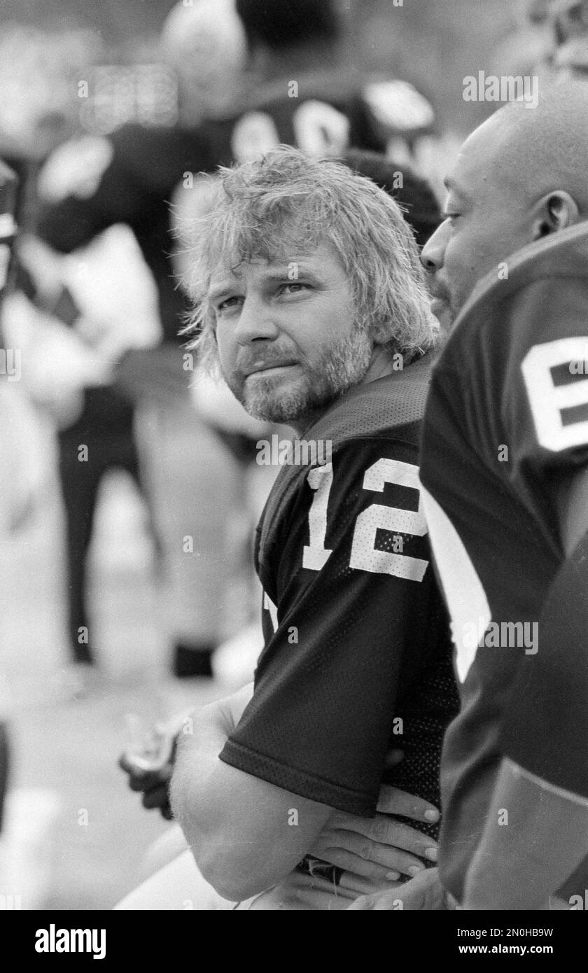 Oakland Raiders quarterback Ken Stabler (12) sits on the sidelines ...