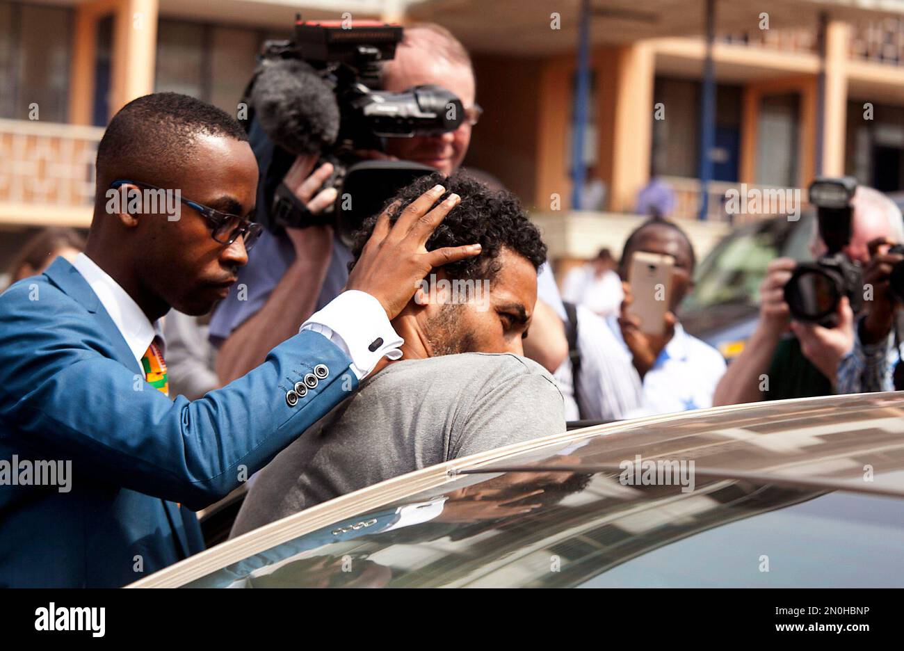 Arthur Simpson-Kent, center, after his appearance at the Kaneshie ...