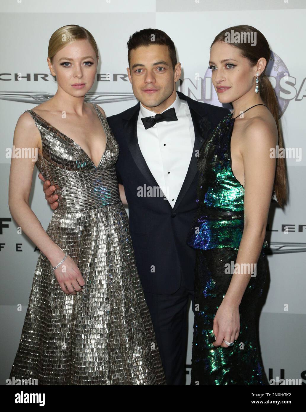 From left, Portia Doubleday, Rami Malek and Carly Chaikin arrive at the ...