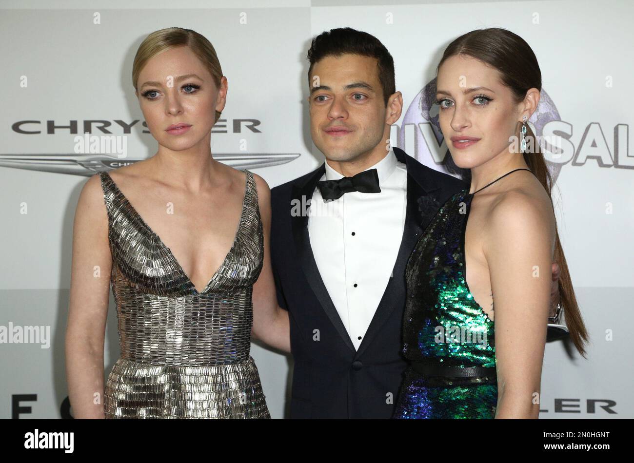 From left, Portia Doubleday, Rami Malek and Carly Chaikin arrive at the ...
