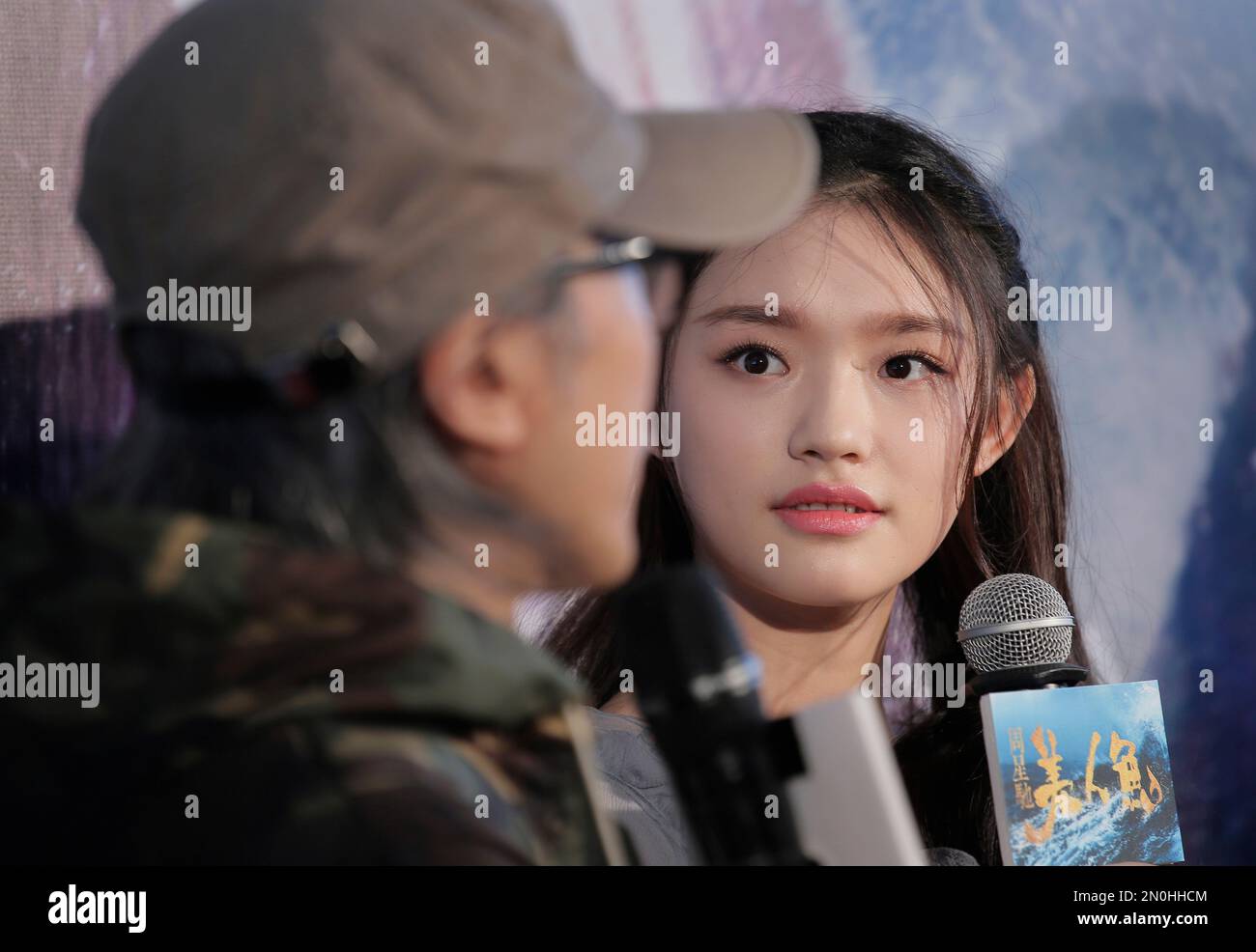 Chinese actress Lin Yun looks at Hong Kong director Stephen Chow during ...