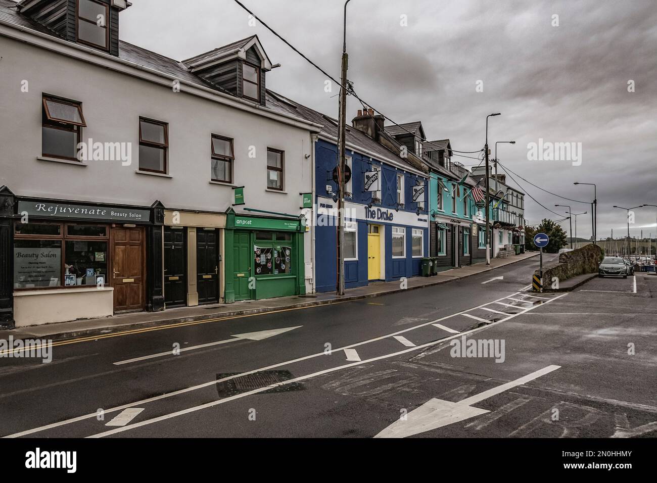 The row of pubs. Seaside Lower Road at Crosshaven village, co Cork ...