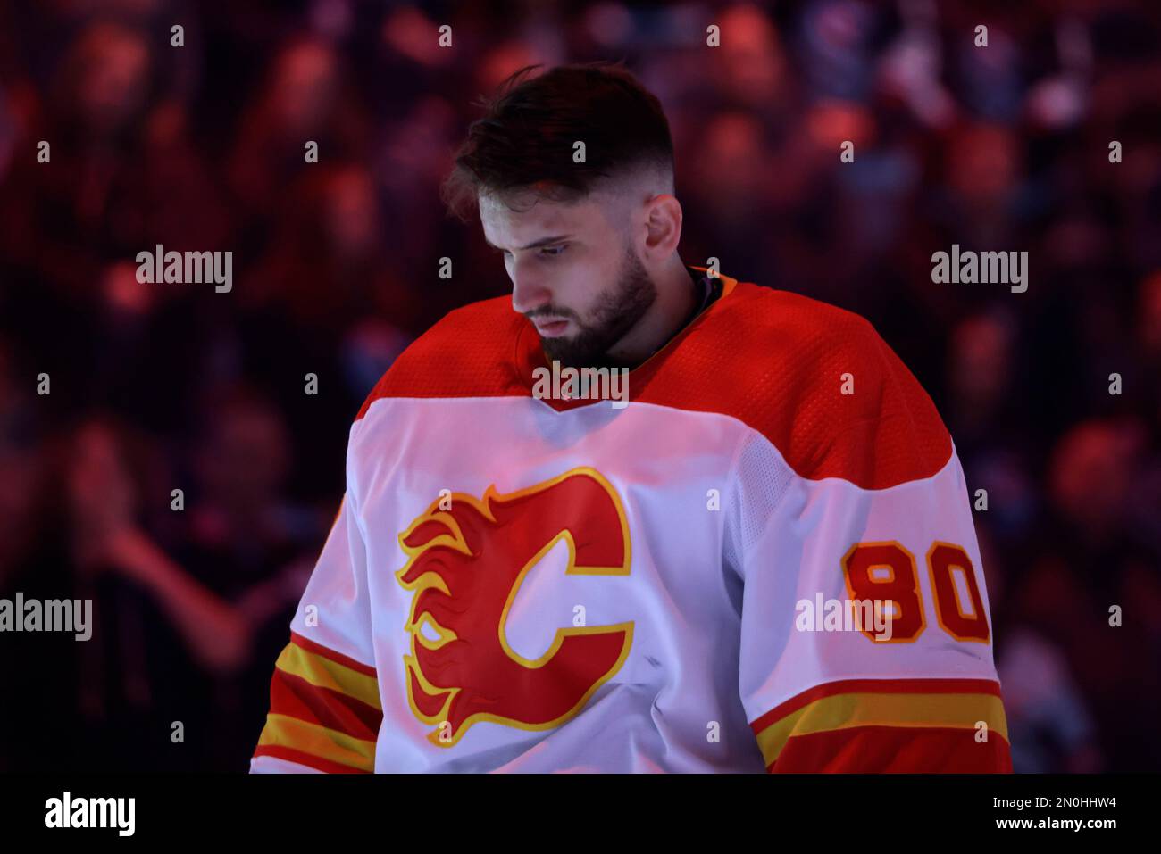 Calgary Flames goaltender Dan Vladar (80) stands with his head down ...