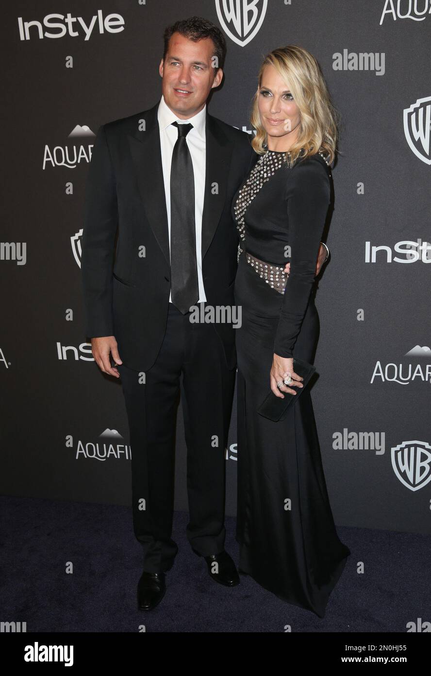 Scott Stuber, left, and Molly Sims arrive at the InStyle and Warner ...