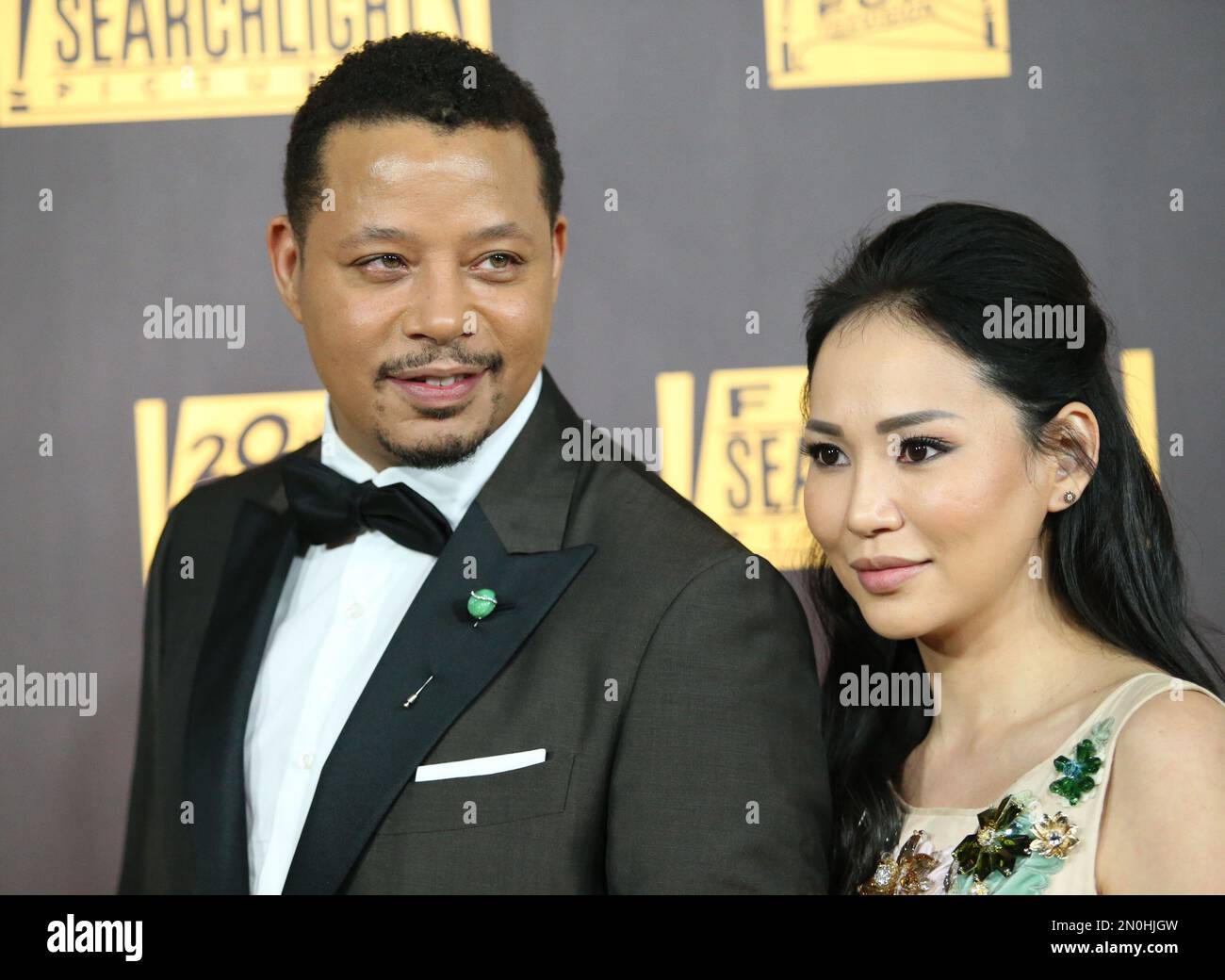 Terrence Howard, left, and Miranda Pak arrive at the FOX Golden Globes ...