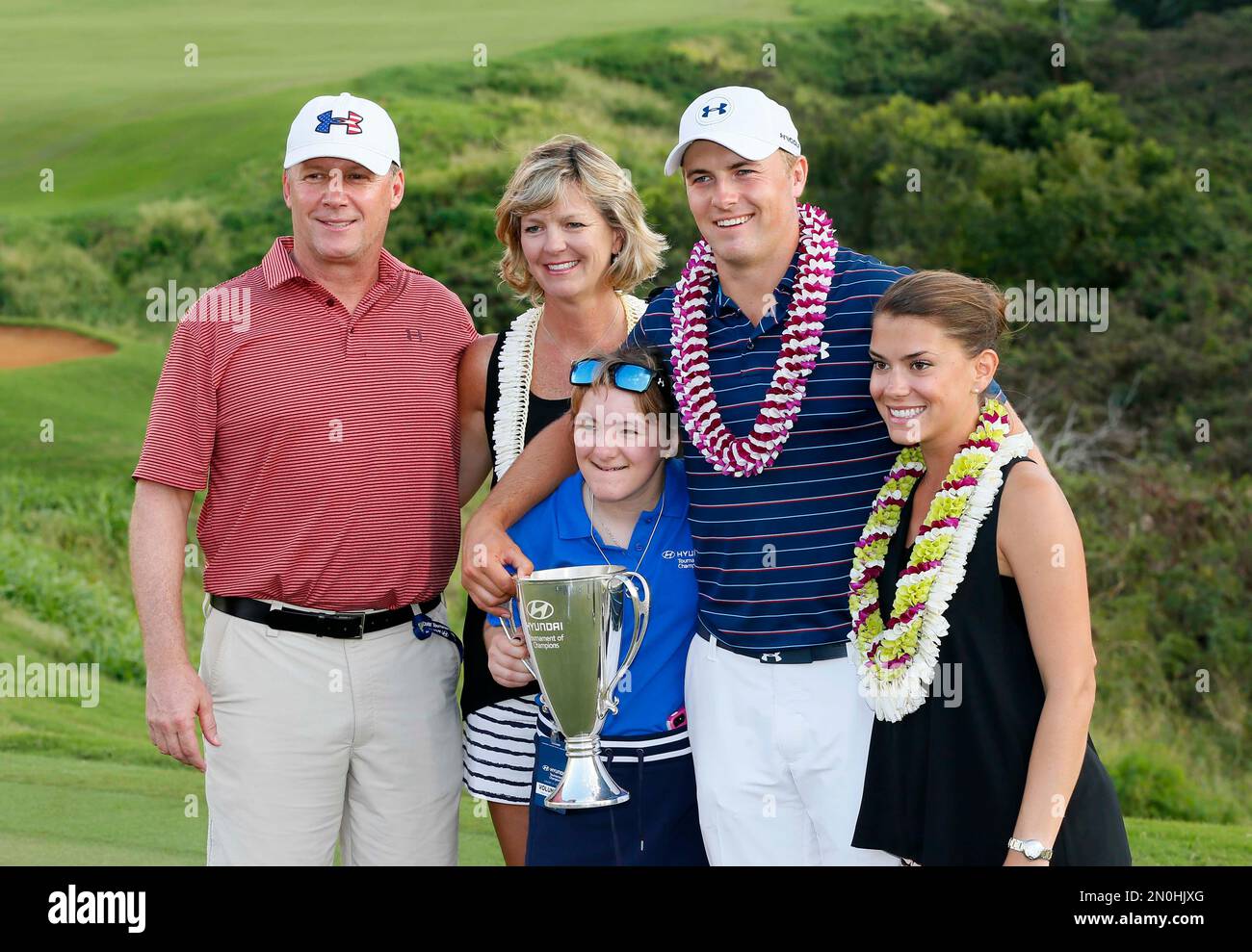 Jordan Spieth poses for a photo with his family, from left, dad Shawn ...