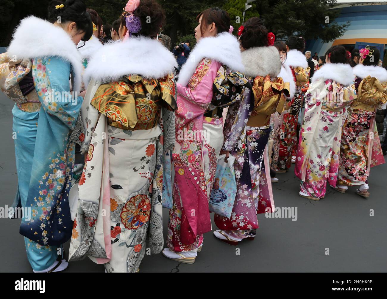 Kimono-clad women, who'll be 20 years old this year, arrive for a ...