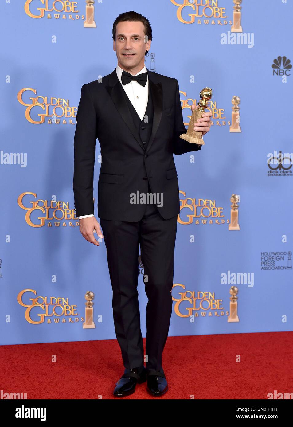 Jon Hamm poses in the press room with the award for best performance by ...