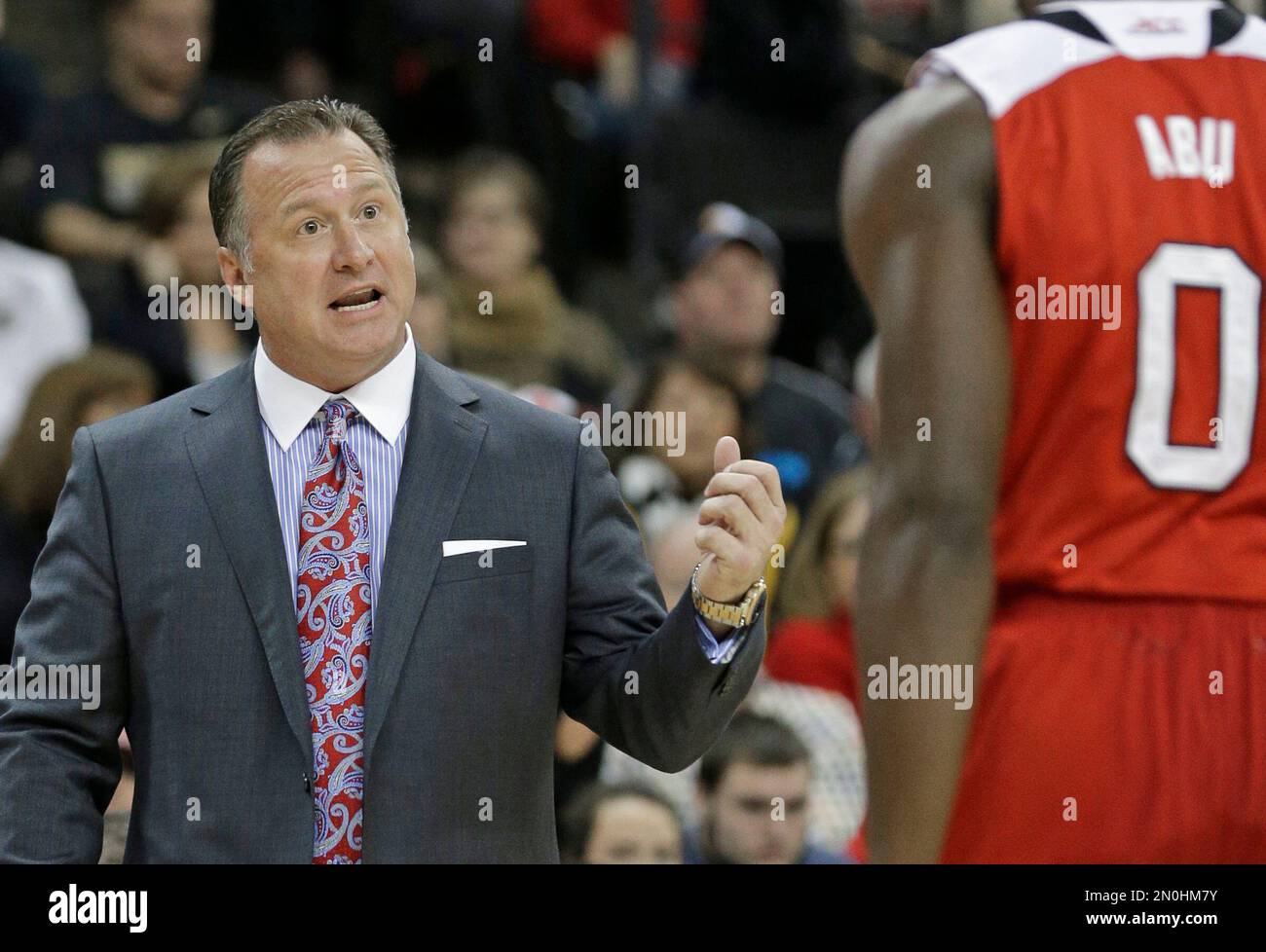 North Carolina State head coach Mark Gottfried, left, talks with Abdul ...
