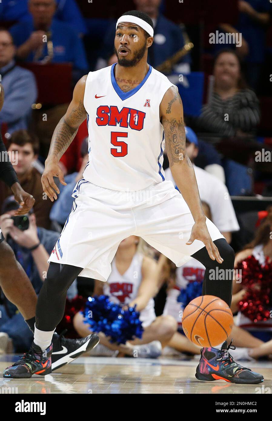 SMU forward Markus Kennedy (5) looks for room against the Central ...