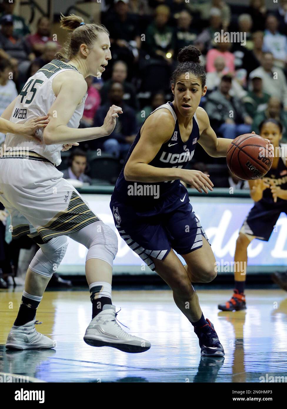 Connecticut guard Kia Nurse (11) drives around South Florida center ...
