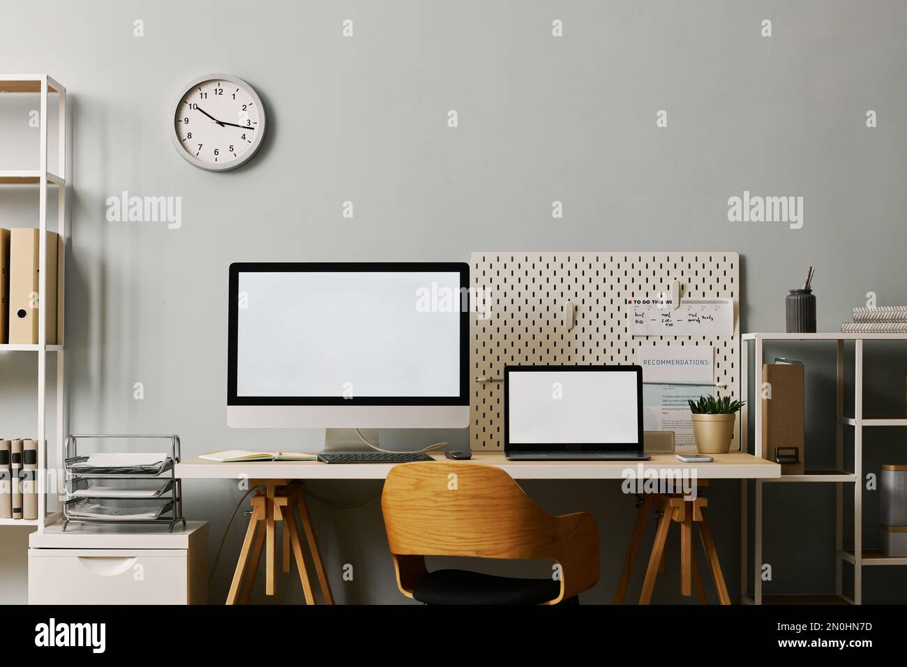 Background image of modern office workplace setup with two screen ...