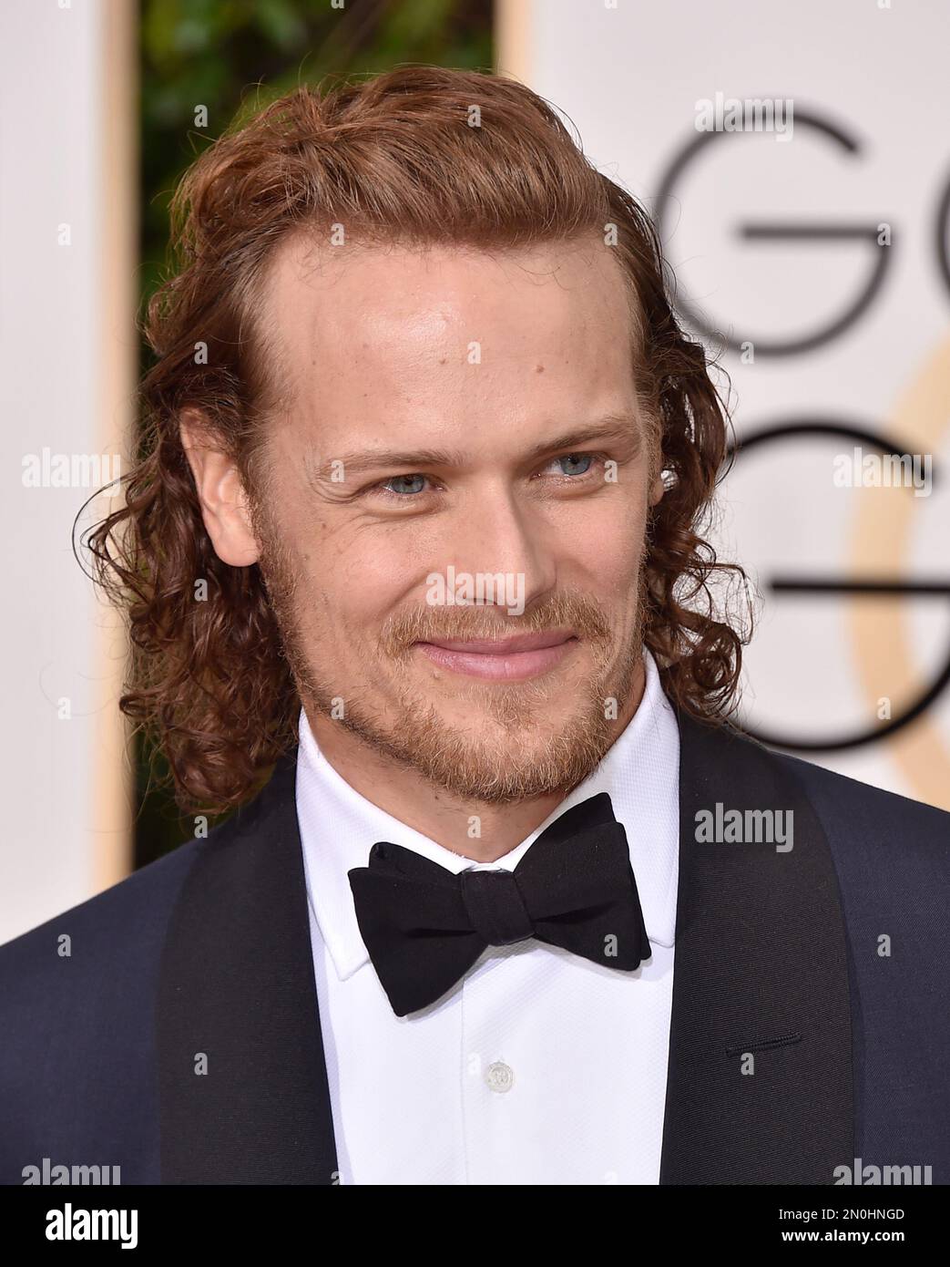 Sam Heughan arrives at the 73rd annual Golden Globe Awards on Sunday ...