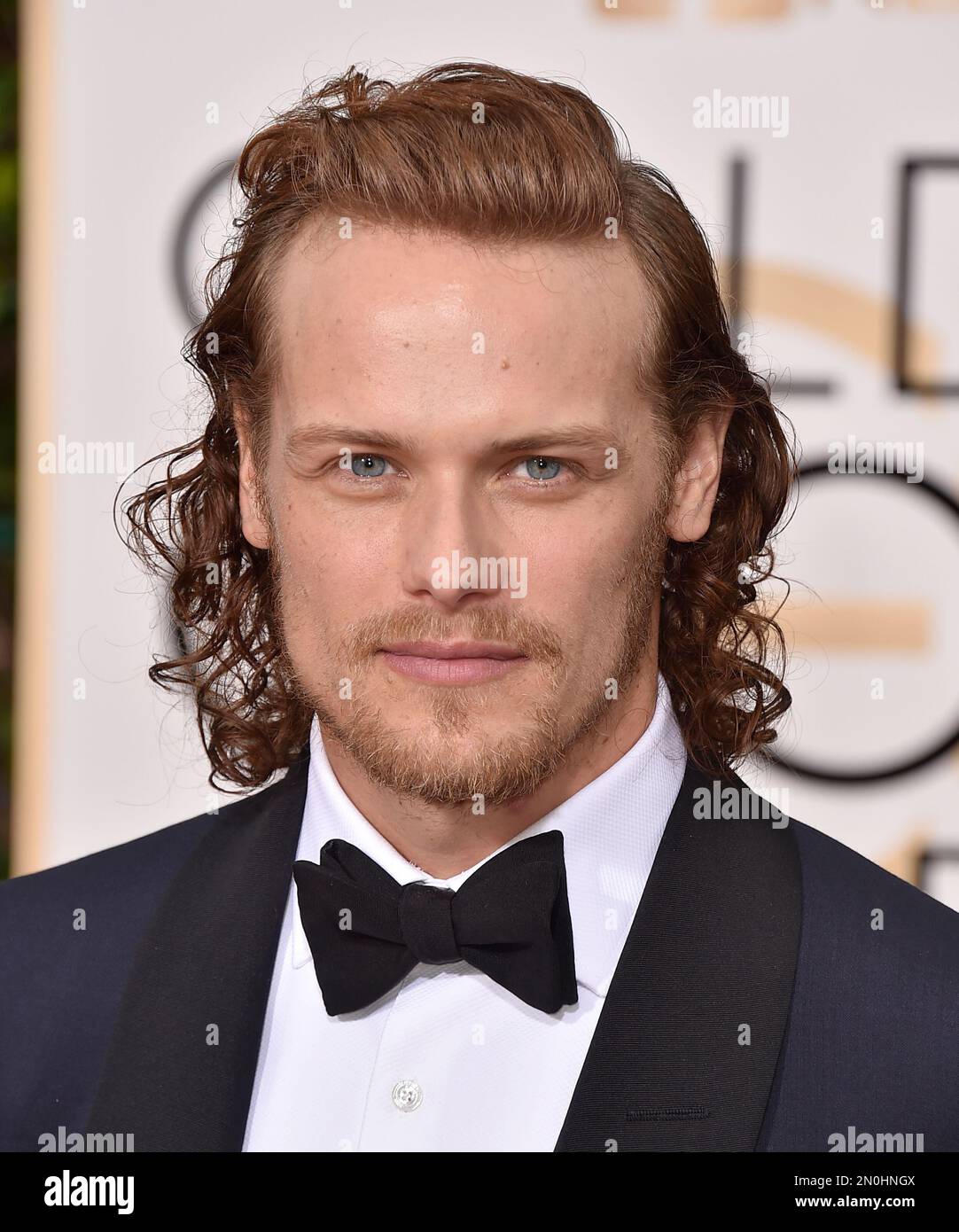 Sam Heughan arrives at the 73rd annual Golden Globe Awards on Sunday ...