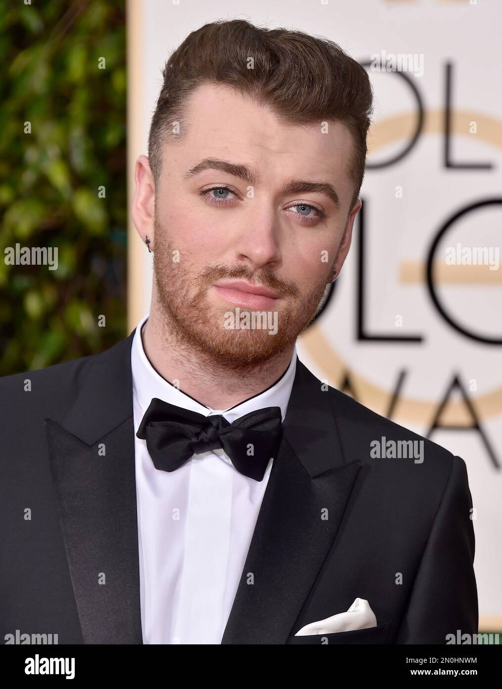 Sam Smith arrives at the 73rd annual Golden Globe Awards on Sunday, Jan ...