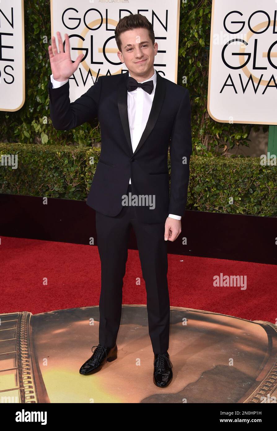 Charlie Puth arrives at the 73rd annual Golden Globe Awards on Sunday ...