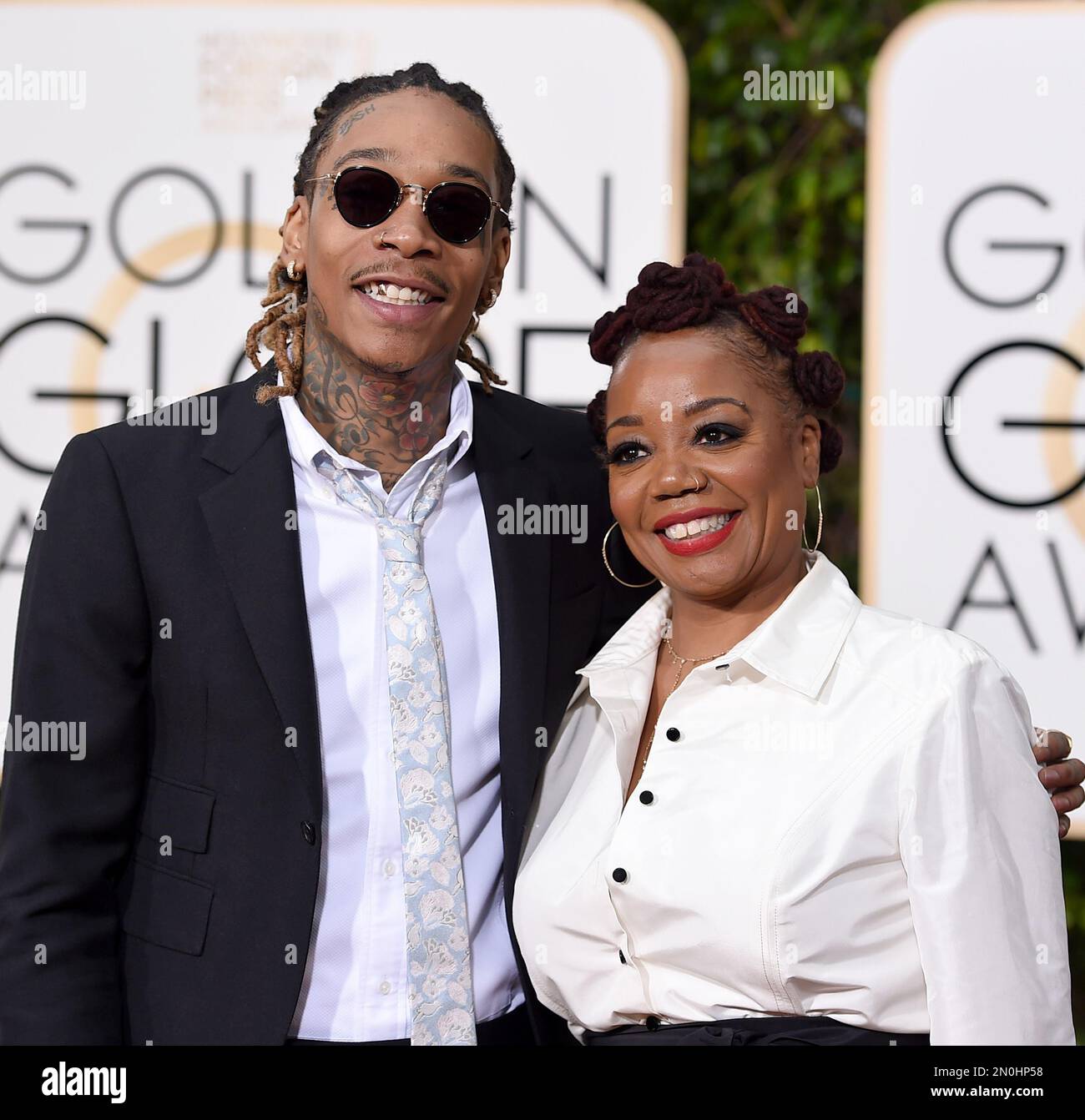 Wiz Khalifa, left, and Peachie Wimbush arrive at the 73rd annual Golden ...