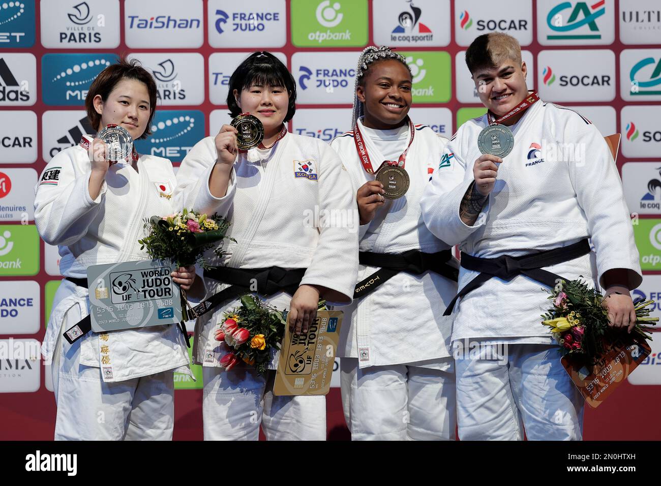 Gold medalist South Korea' Hayun Kim, second left, celebrates on the ...