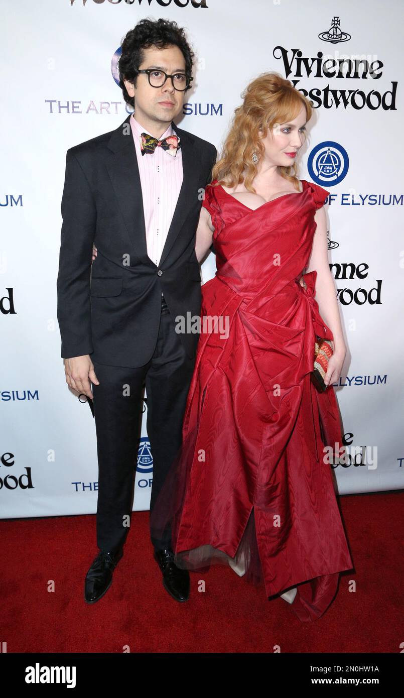 Geoffrey Arend, left, and Christina Hendricks arrive at The Art of ...