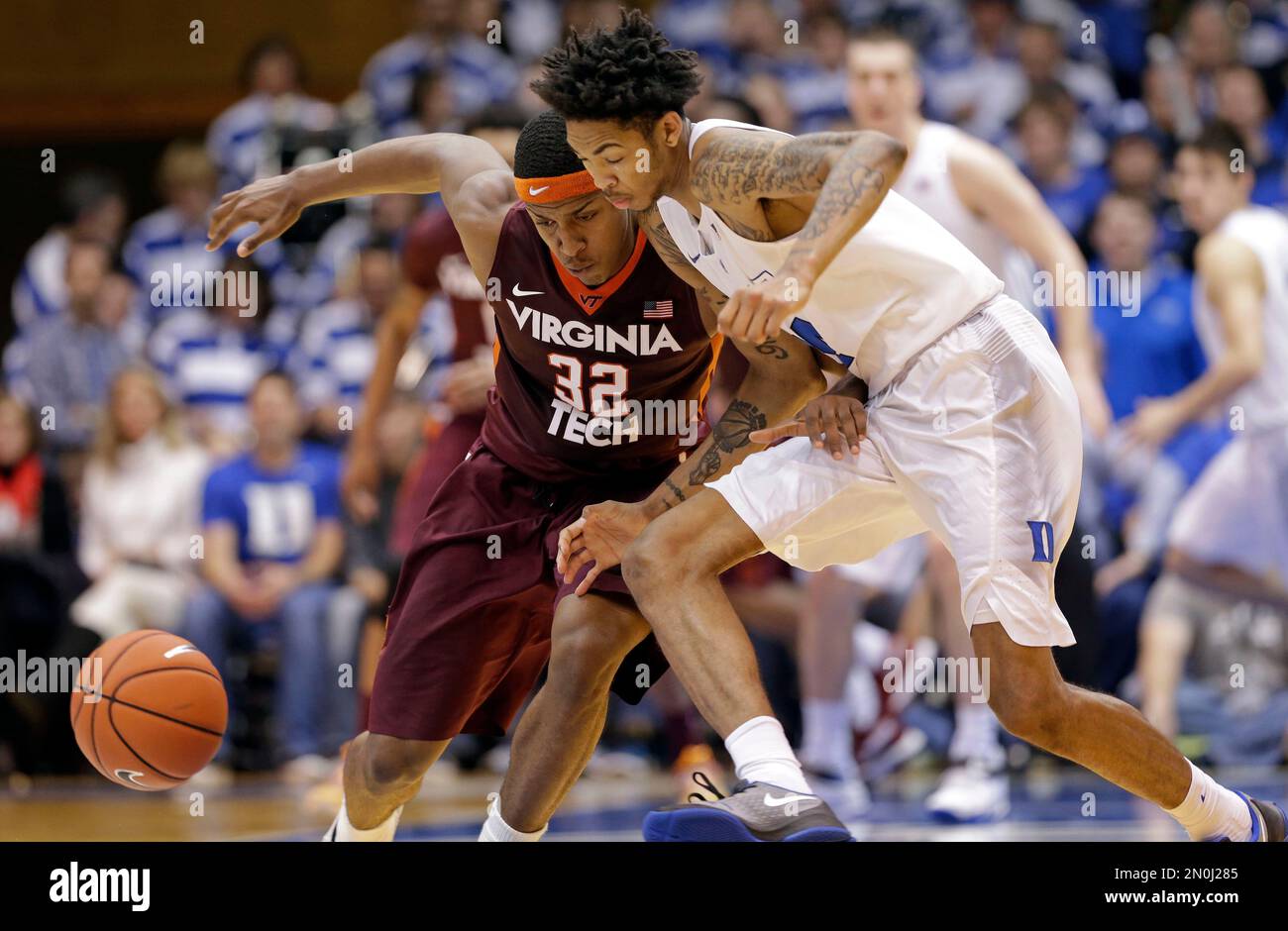 Virginia Tech's Zach LeDay (32) and Duke's Brandon Ingram (14) chase ...