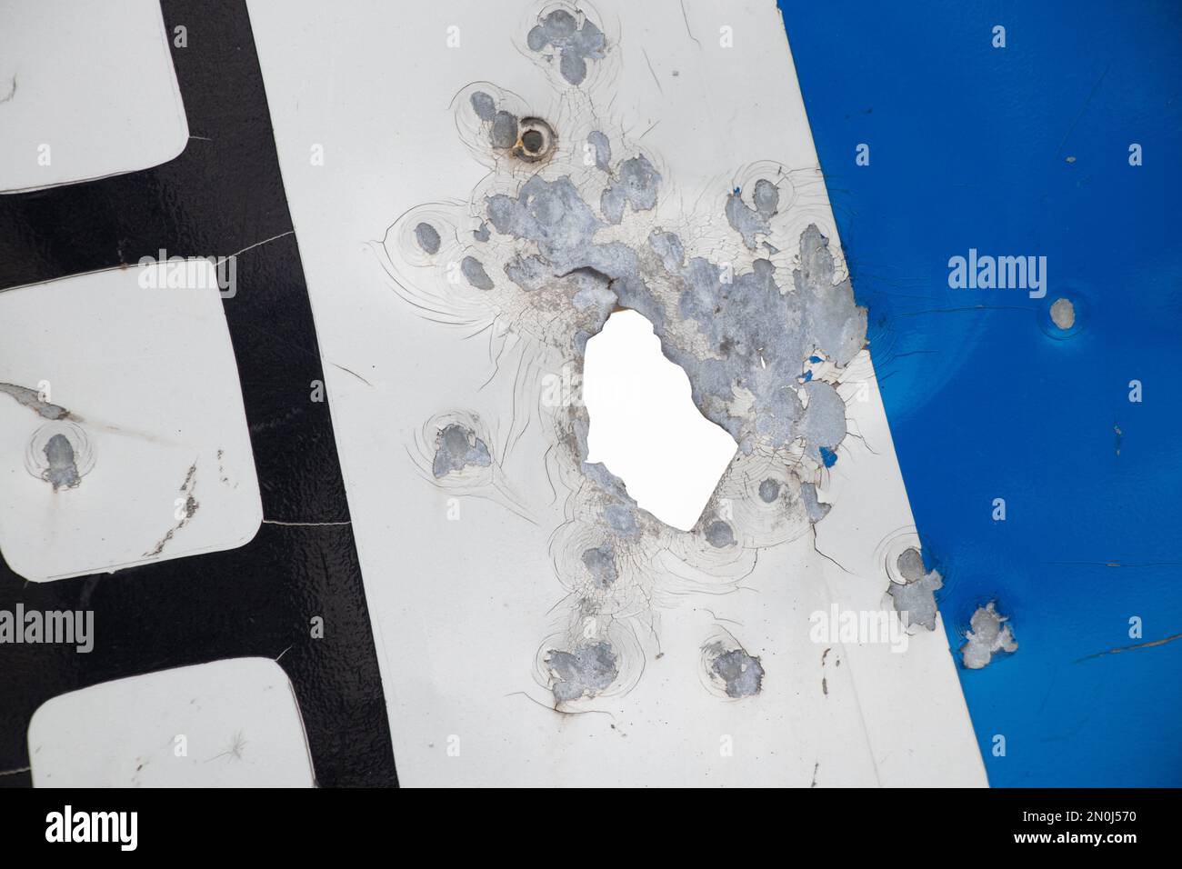 Bus road sign shot by Russian bullets at stops in Ukraine, war in ...