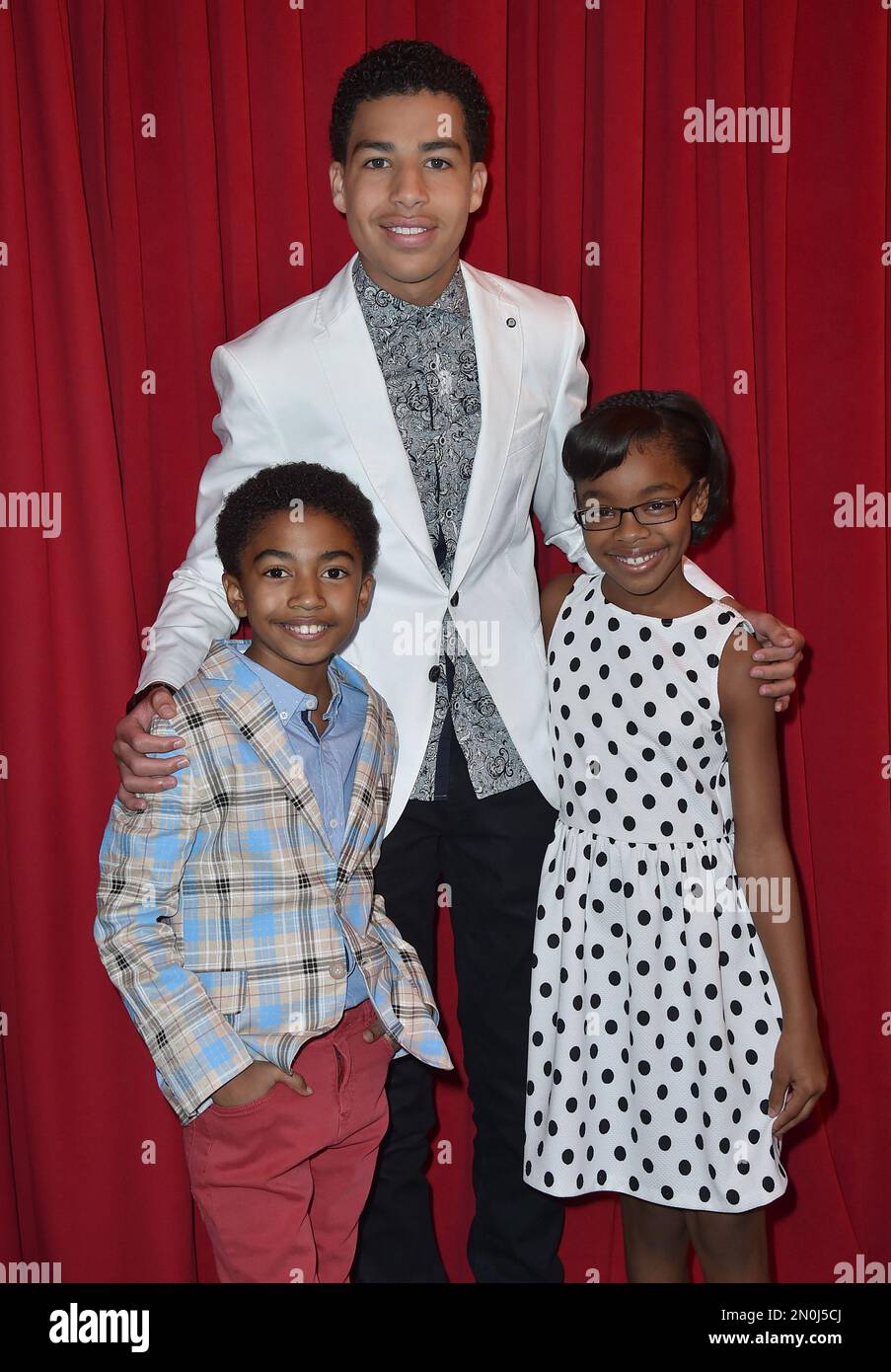 Miles Brown, from left, Marcus Scribner and Marsai Martin arrive at the ...