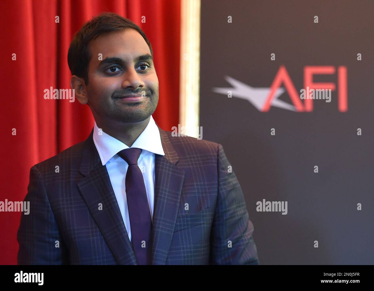 Aziz Ansari arrives at the AFI Awards at the Four Seasons Hotel on ...