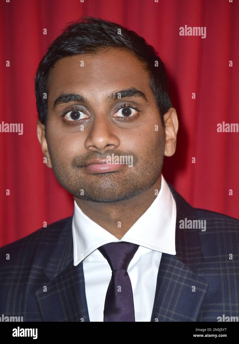 Aziz Ansari arrives at the AFI Awards at the Four Seasons Hotel on ...