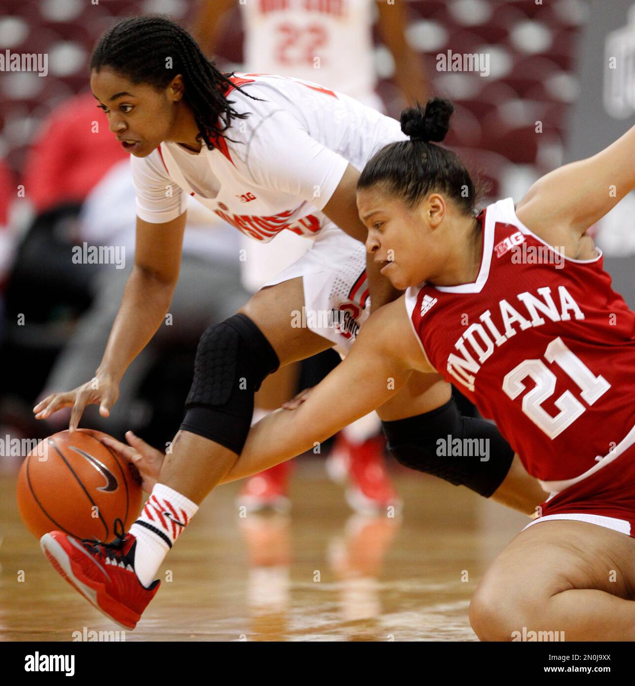 Ohio State's Asia Doss, left, works for a loose ball against Indiana's ...