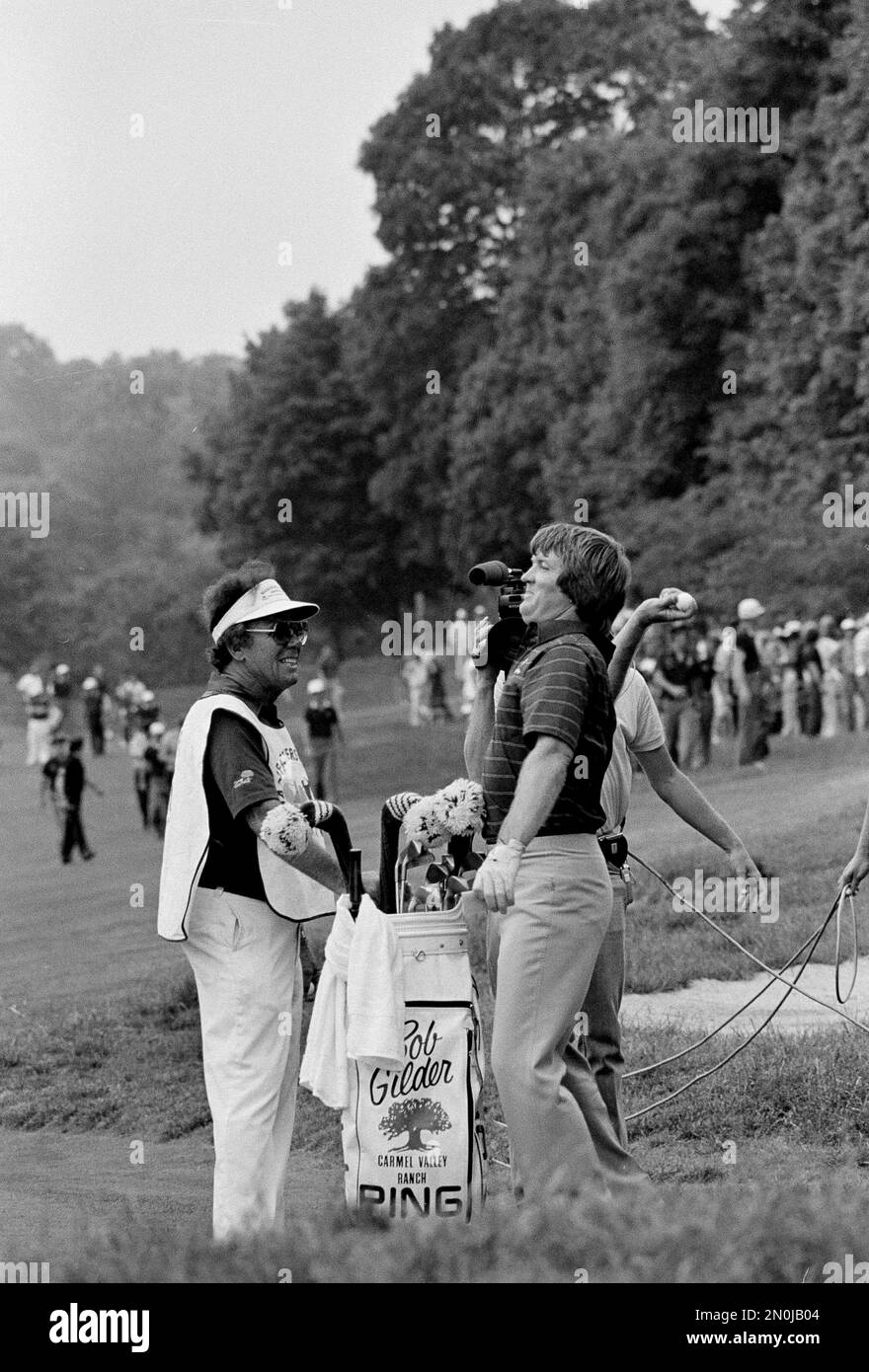 Bob Gilder throws his ball into the gallery after winning the ...