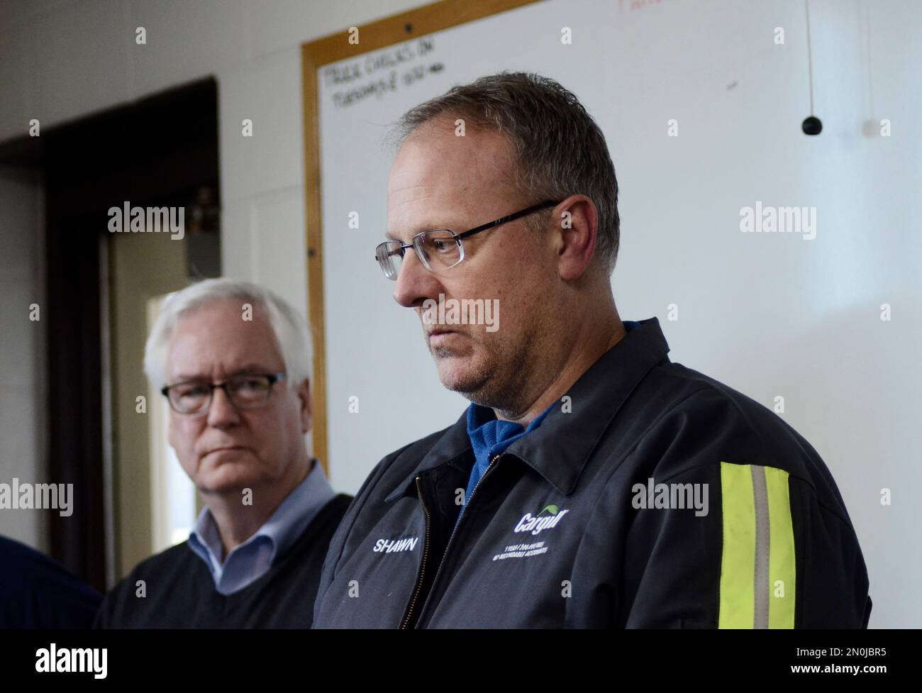 Cargill Mine Manager Shawn Wilczynski, right, speaks during an early ...