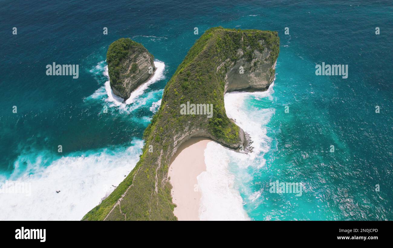 Best travel destination Kelingking sandy beach with tall overgrown ...