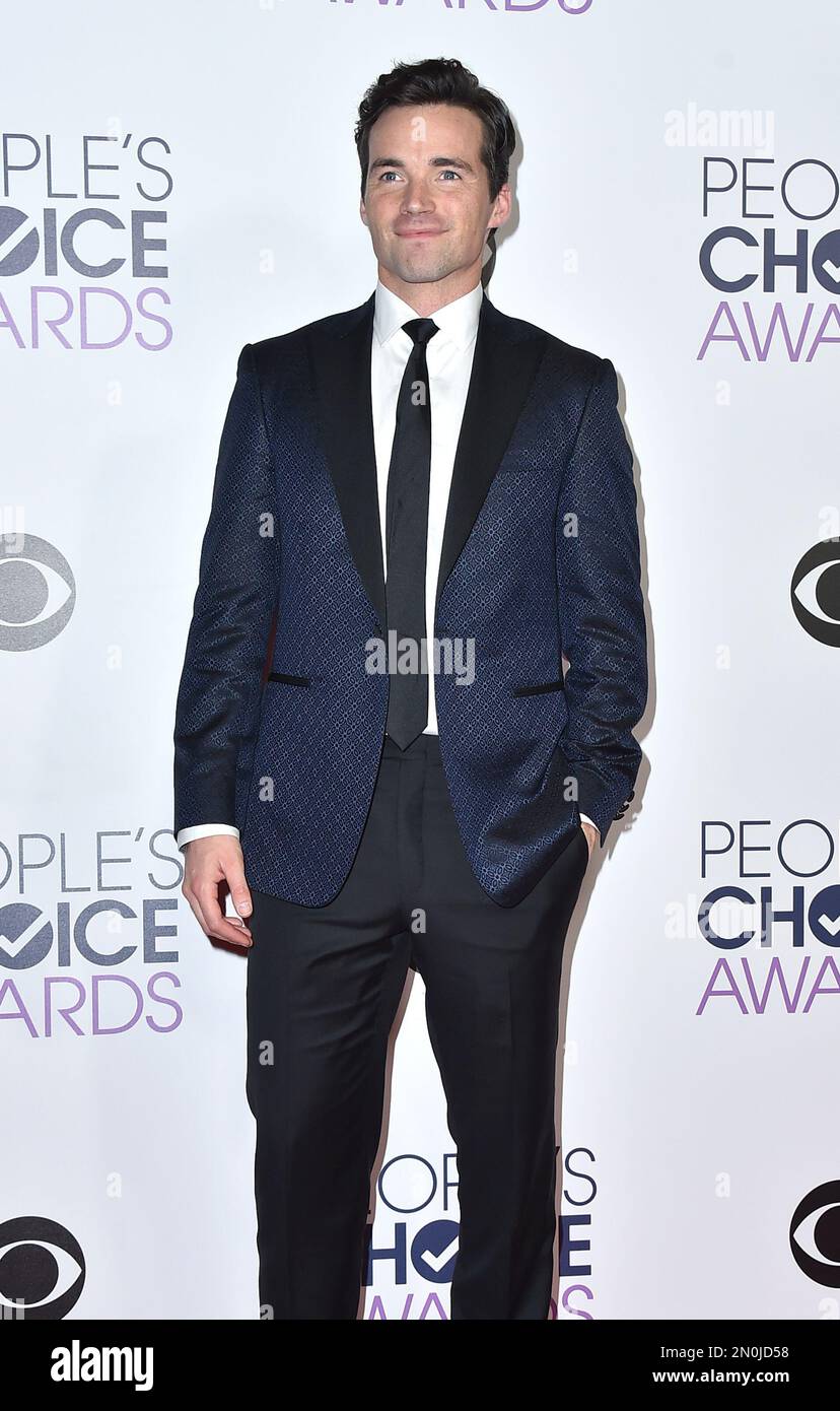 Ian Harding poses in the press room with the award for favorite cable ...