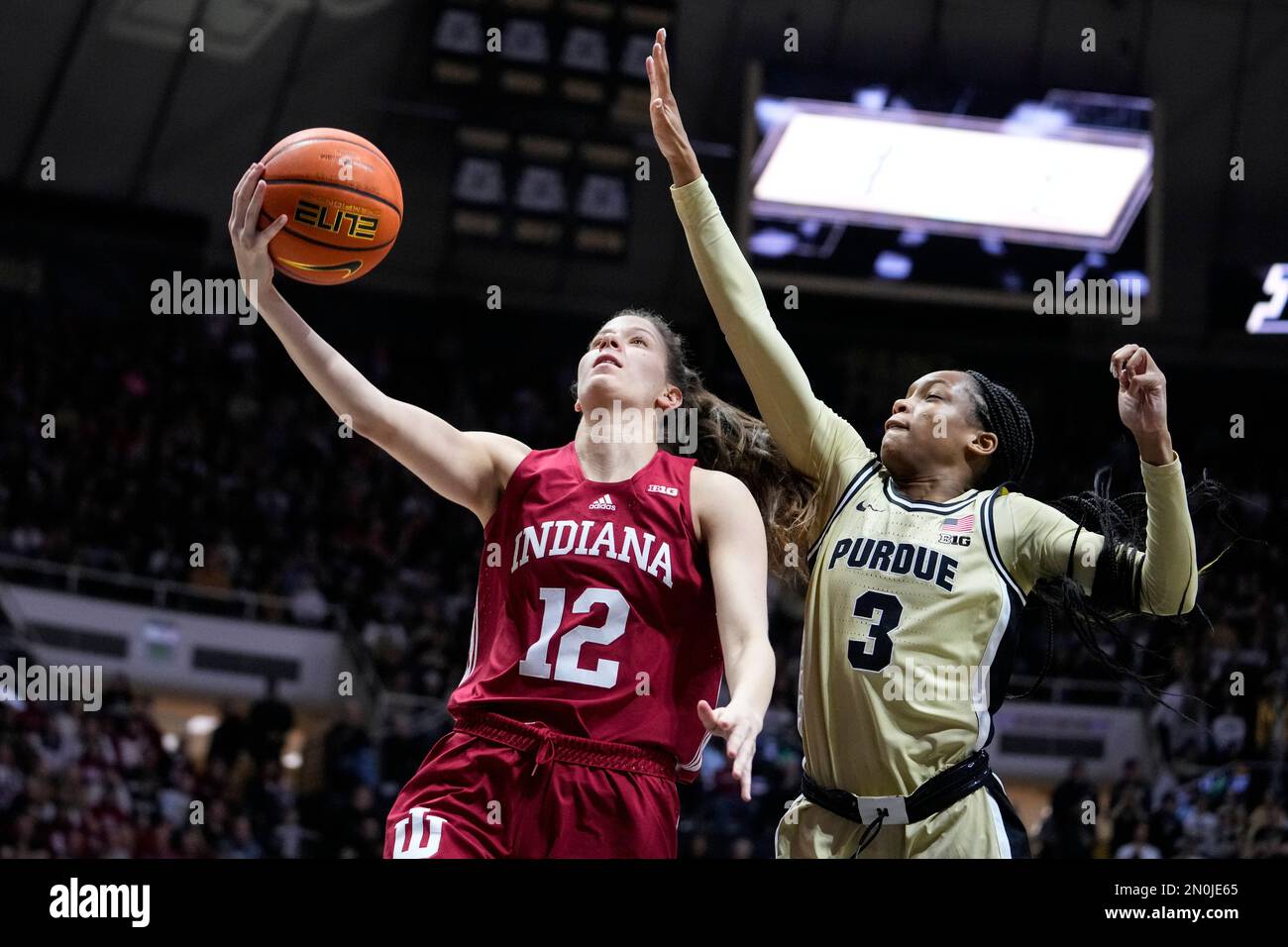Indiana guard Yarden Garzon (12) shoots in front of Purdue guard Jayla ...