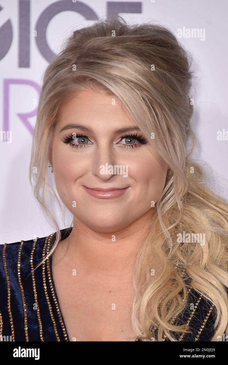 Meghan Trainor arrives at the People's Choice Awards at the Microsoft ...