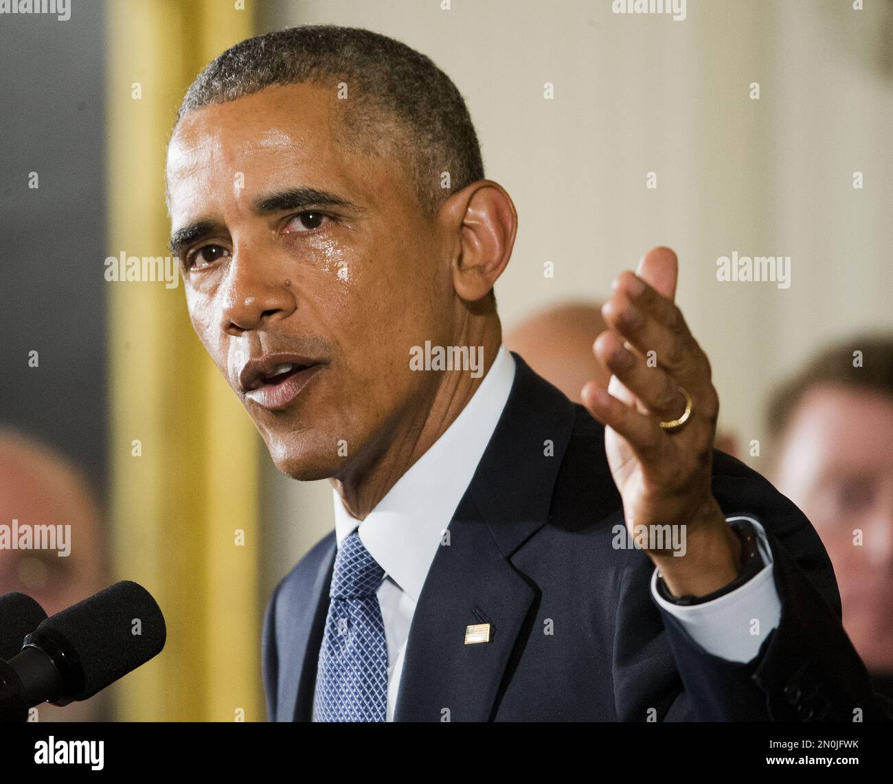 With a tear running from his eye, President Barack Obama recalls the 20 ...