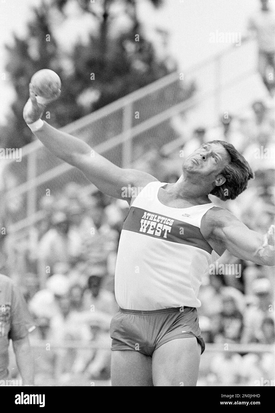 Dave Laut of Athletics West throws the shot put during the Bruce Jenner ...