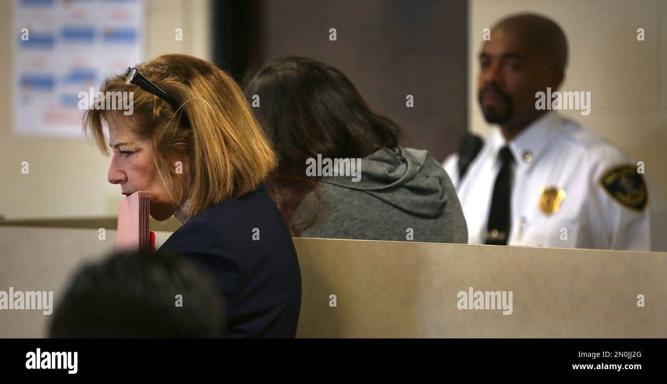 Rachelle Bond, center, appears with defense attorney Janice Bassil ...
