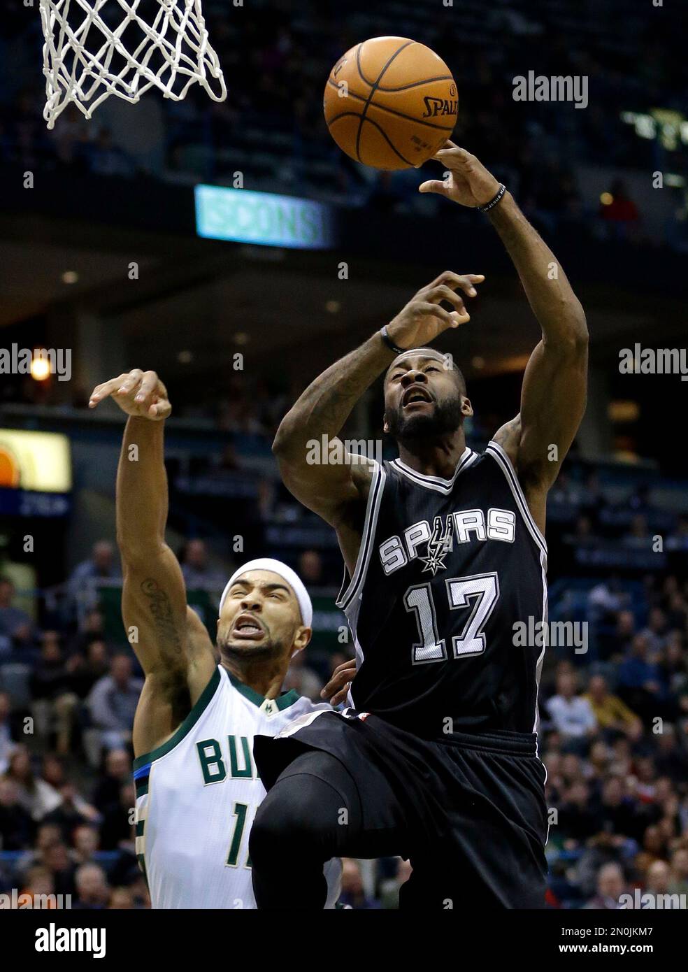 Milwaukee Bucks' Jerryd Bayless blocks a shot attempt by San Antonio ...
