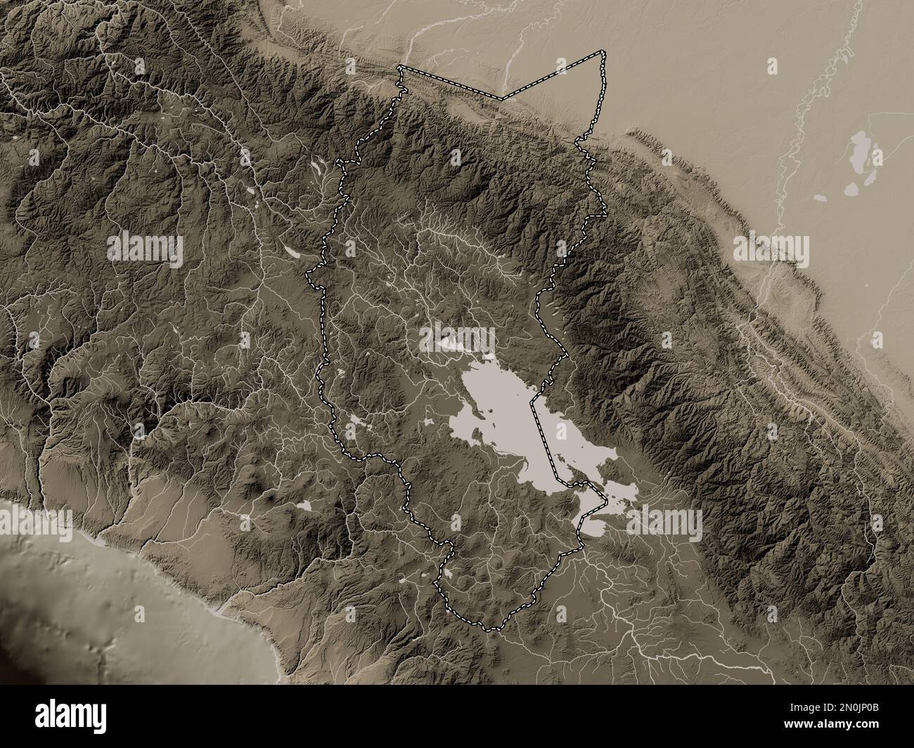 Puno, region of Peru. Elevation map colored in sepia tones with lakes ...