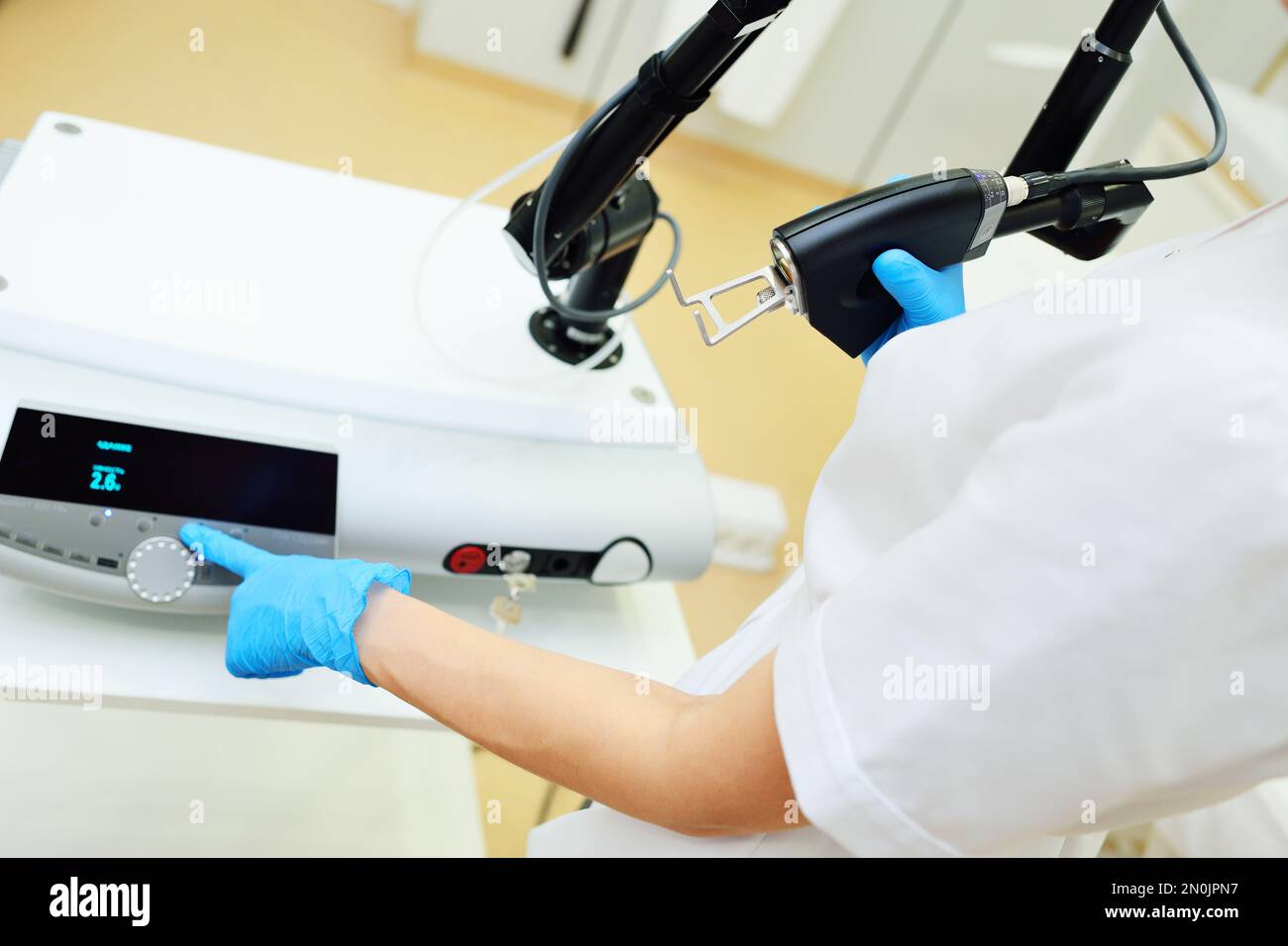 cosmetologist holds a CO2 fractional ablative laser for skin ...