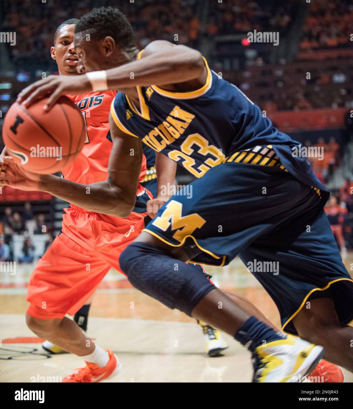 Michigan's guard Caris LeVert (23) and Illinois' guard Malcolm Hill (21 ...