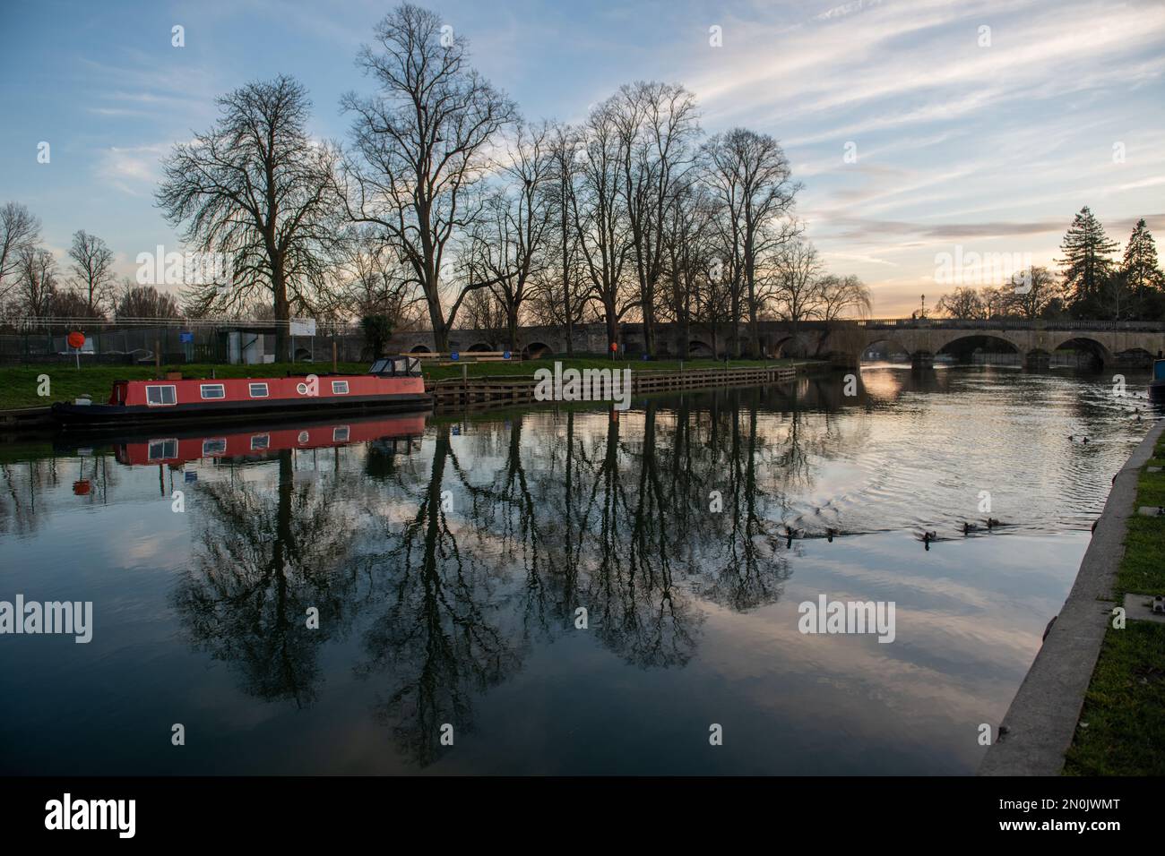 Reflections on the River Thames, with Wallingford Bridge and a red ...