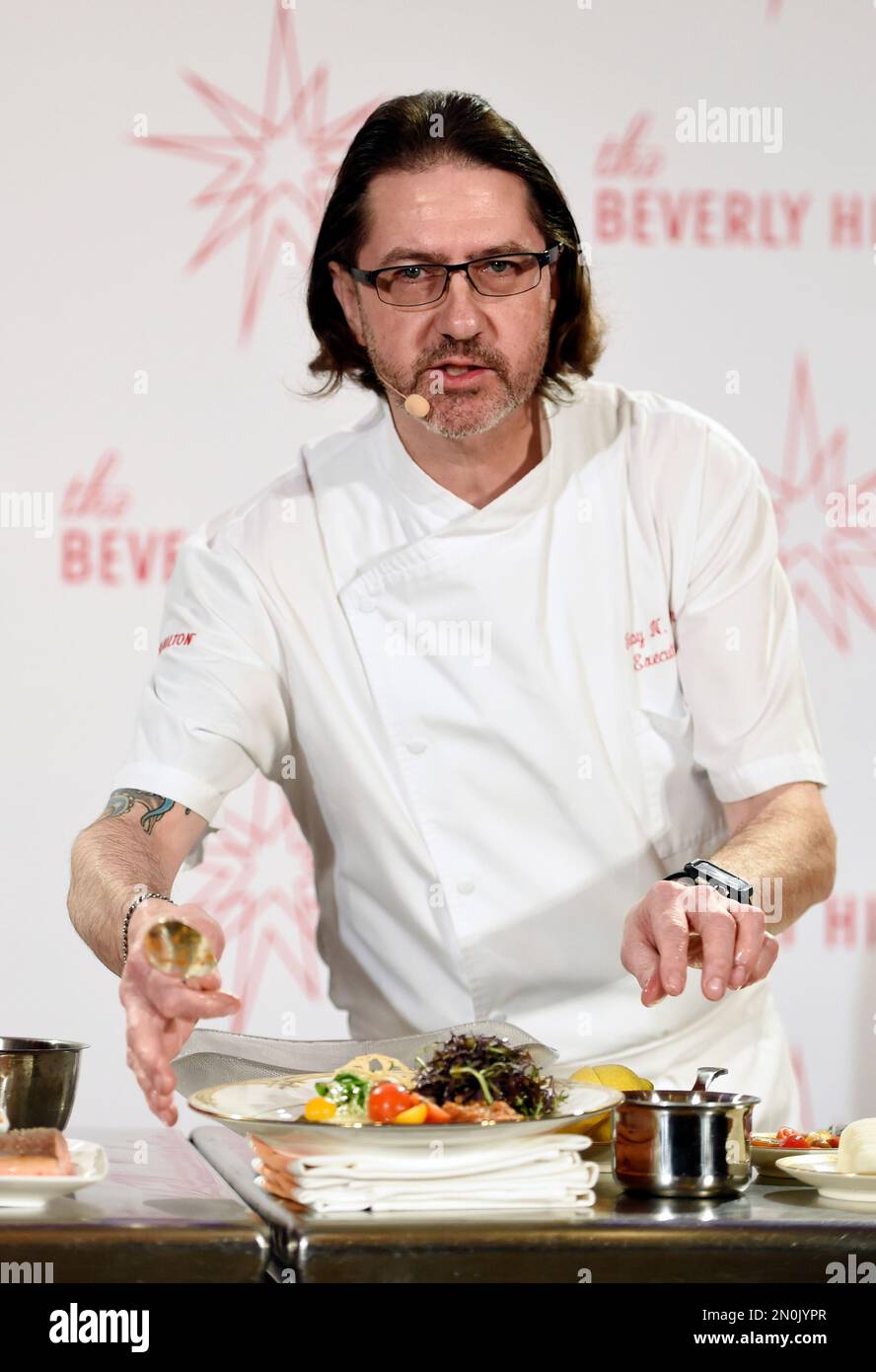 Beverly Hilton Executive Chef Troy Thompson shows off menu items at the ...