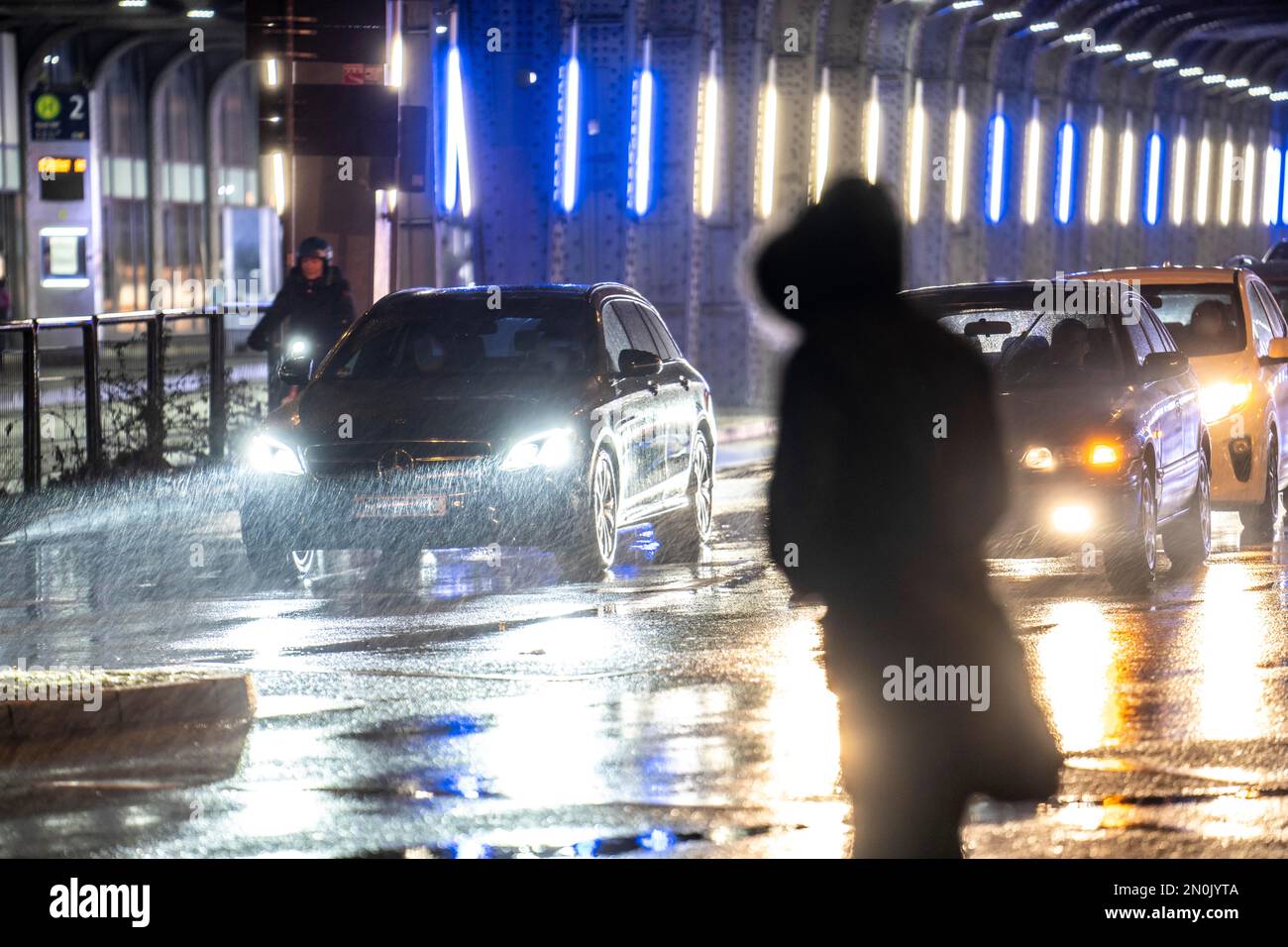 Illuminated subway at the main station, passers-by at a pedestrian ...