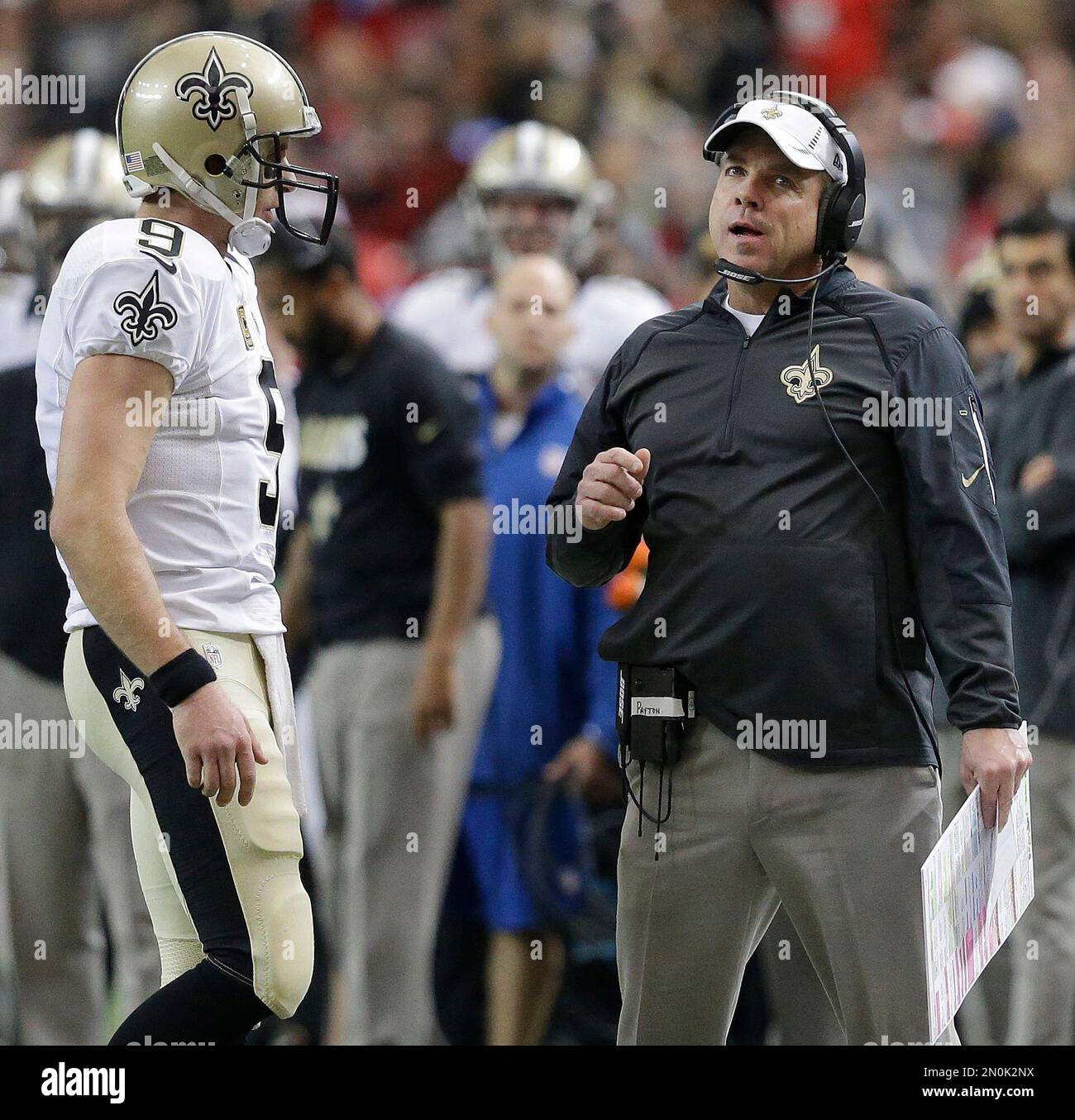 New Orleans Saints quarterback Drew Brees (9) speaks with New Orleans ...