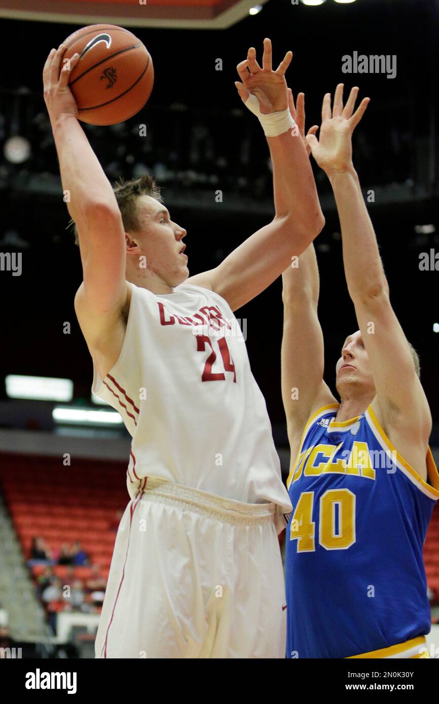 Washington State's Josh Hawkinson (24) shoots against UCLA's Thomas ...