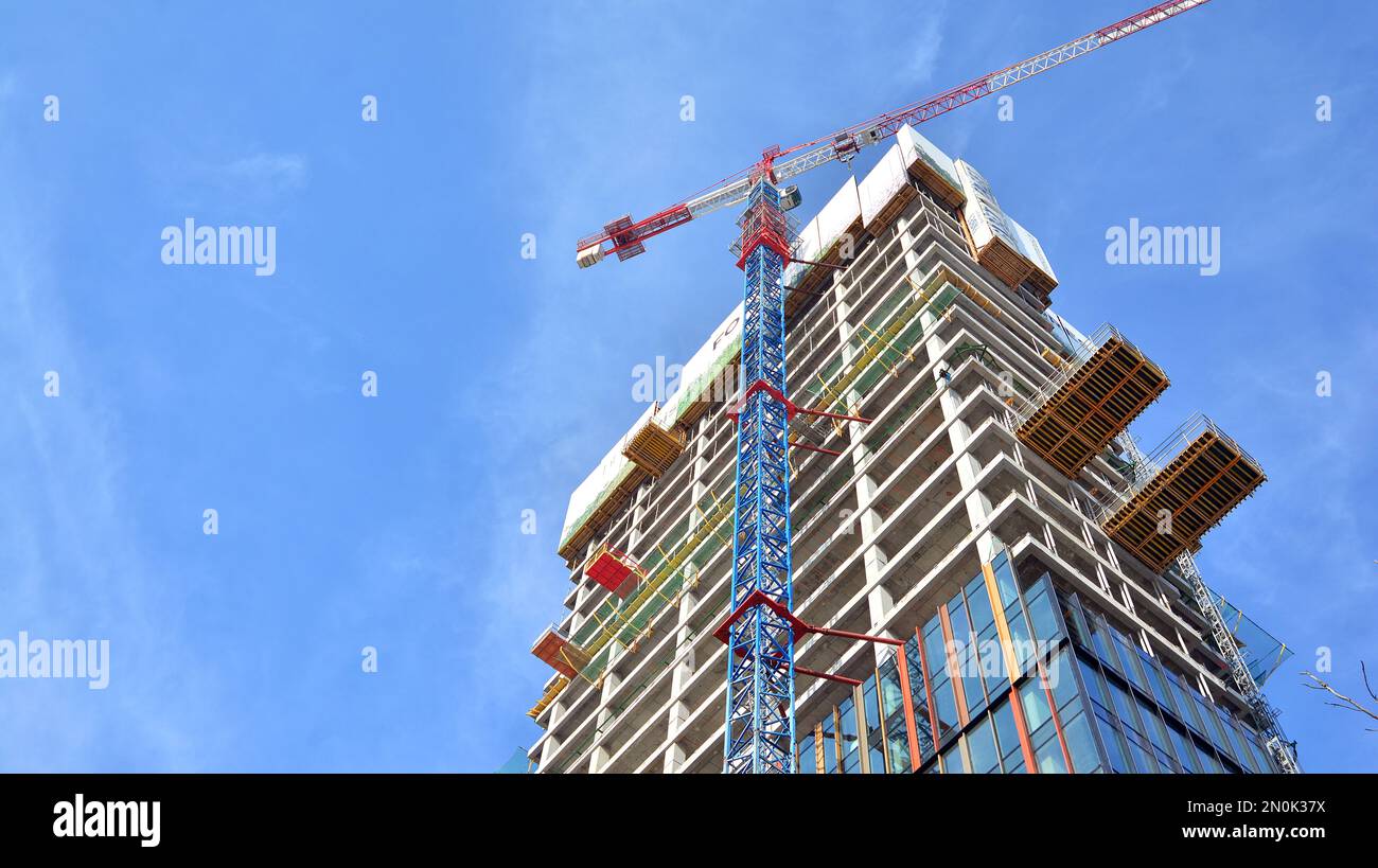 High-rise building under construction. Modern office building Stock ...