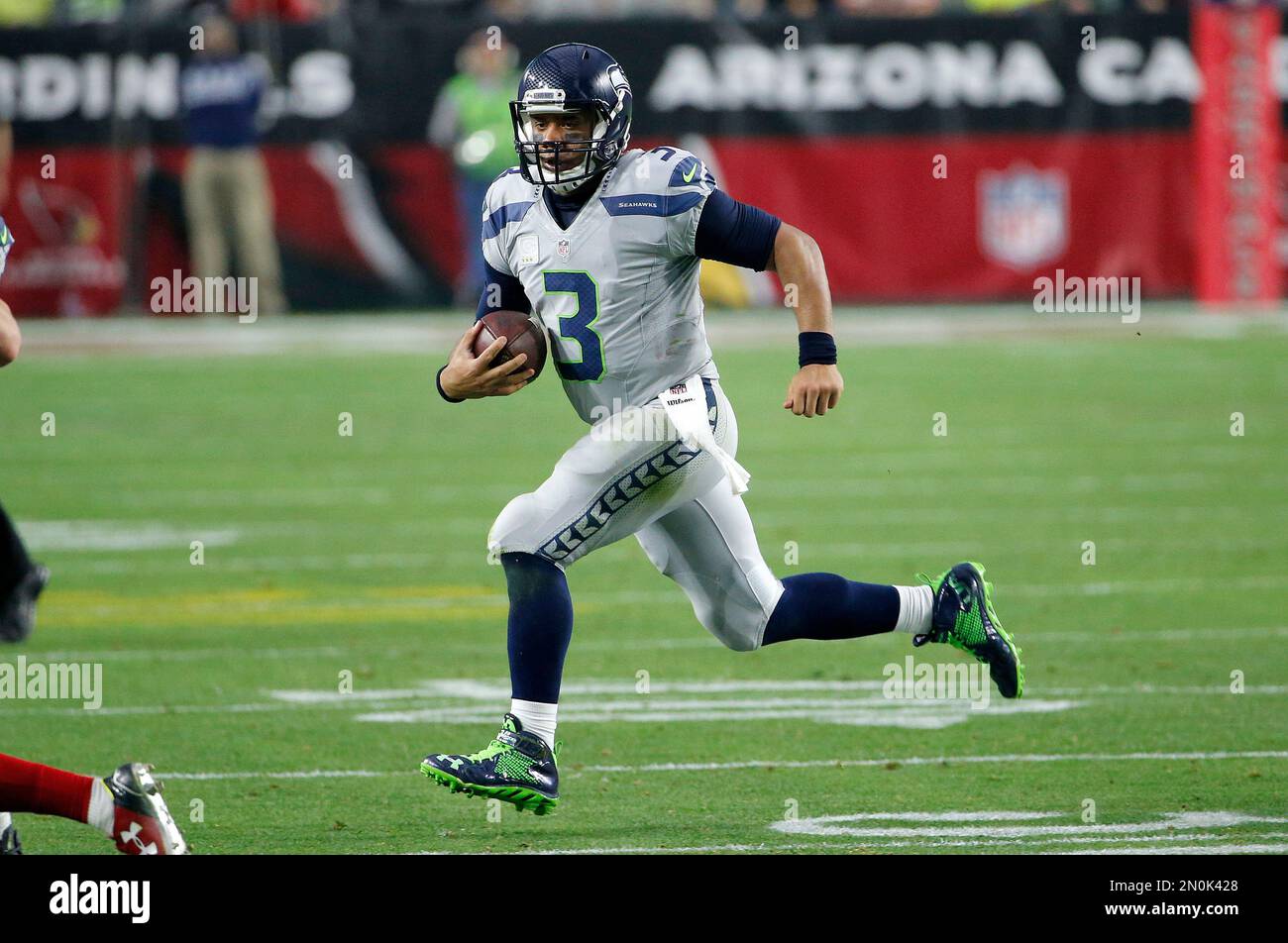Seattle Seahawks quarterback Russell Wilson (3) scrambles against the ...