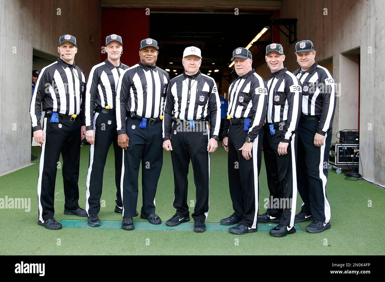 NFL line judge Kevin Codey, from left, head linesman Dana McKenzie ...